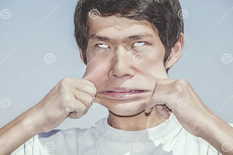 Pull the cheeks stock image. Image of eyes, hair, lips - 36030807