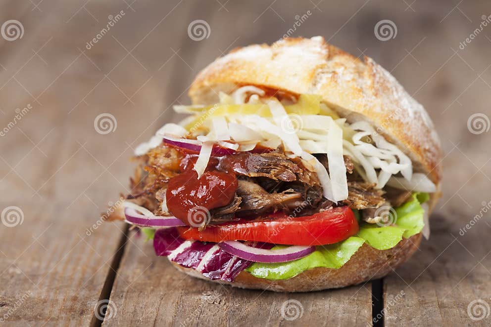 Pulled pork in a bun stock image. Image of portion, plank - 67701833