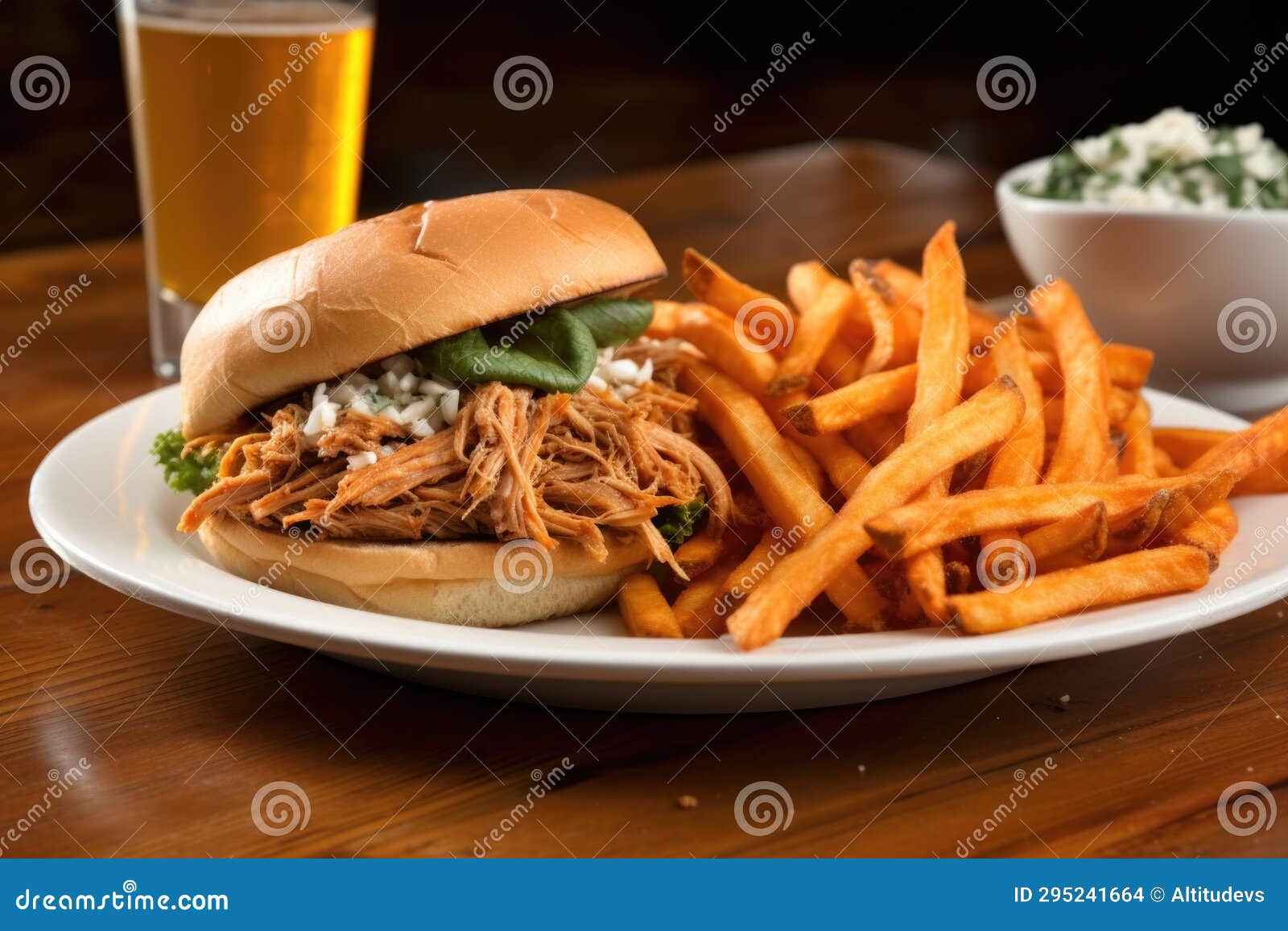Pulled Pork Sandwich with a Side of Sweet Potato Fries Stock Photo ...