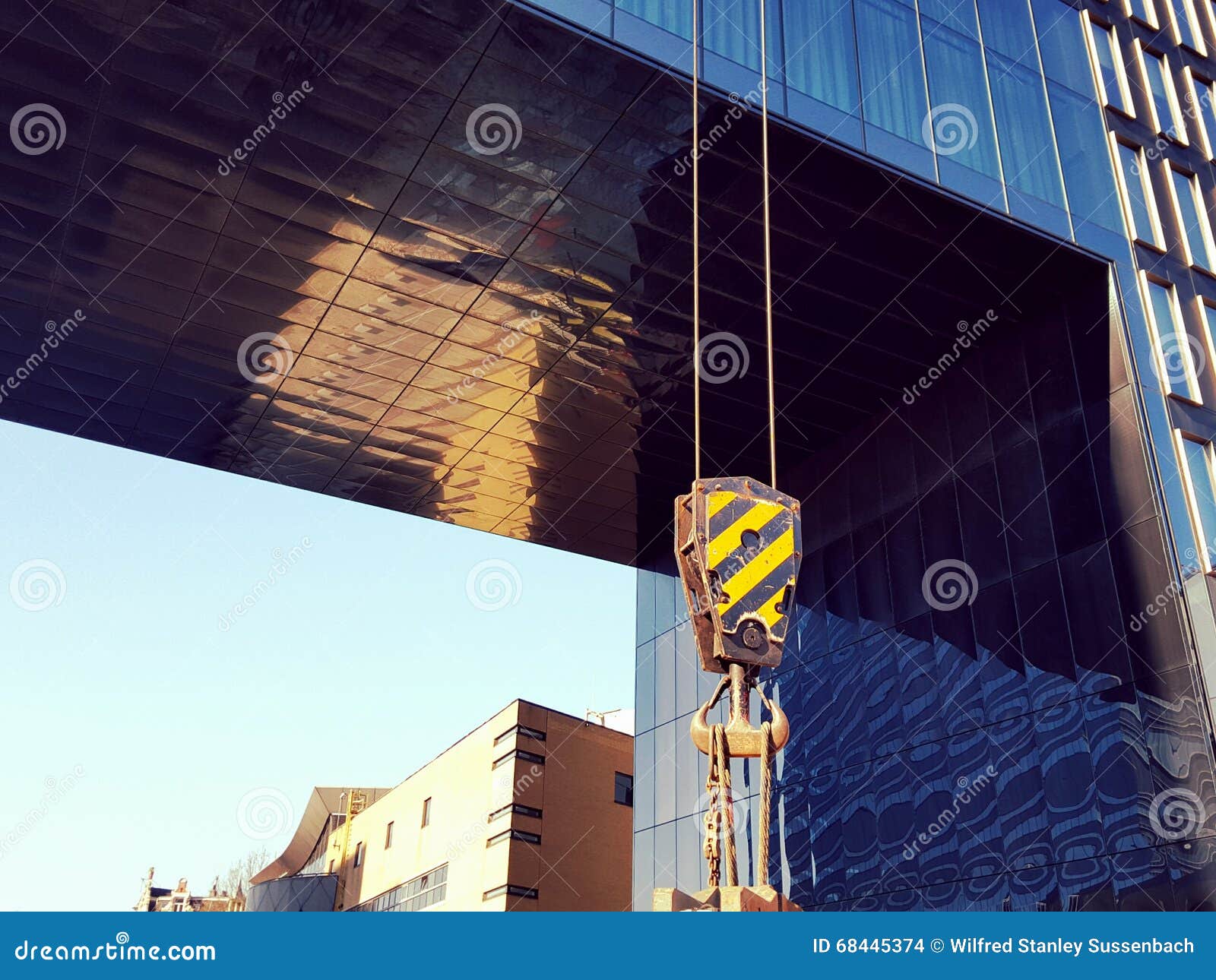 Pulley on building stock photo. Image of daytime, sunny - 68445374