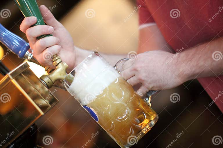 Pulling a beer tap stock photo. Image of spout, drinks - 22133106