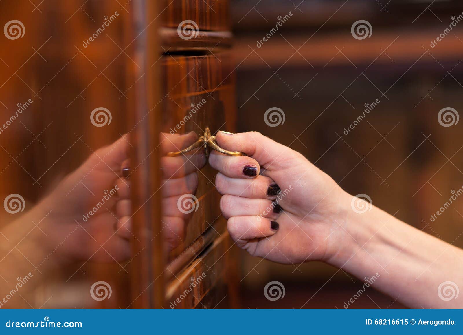 Pulling on a drawer knob stock image. Image of gloss - 68216615