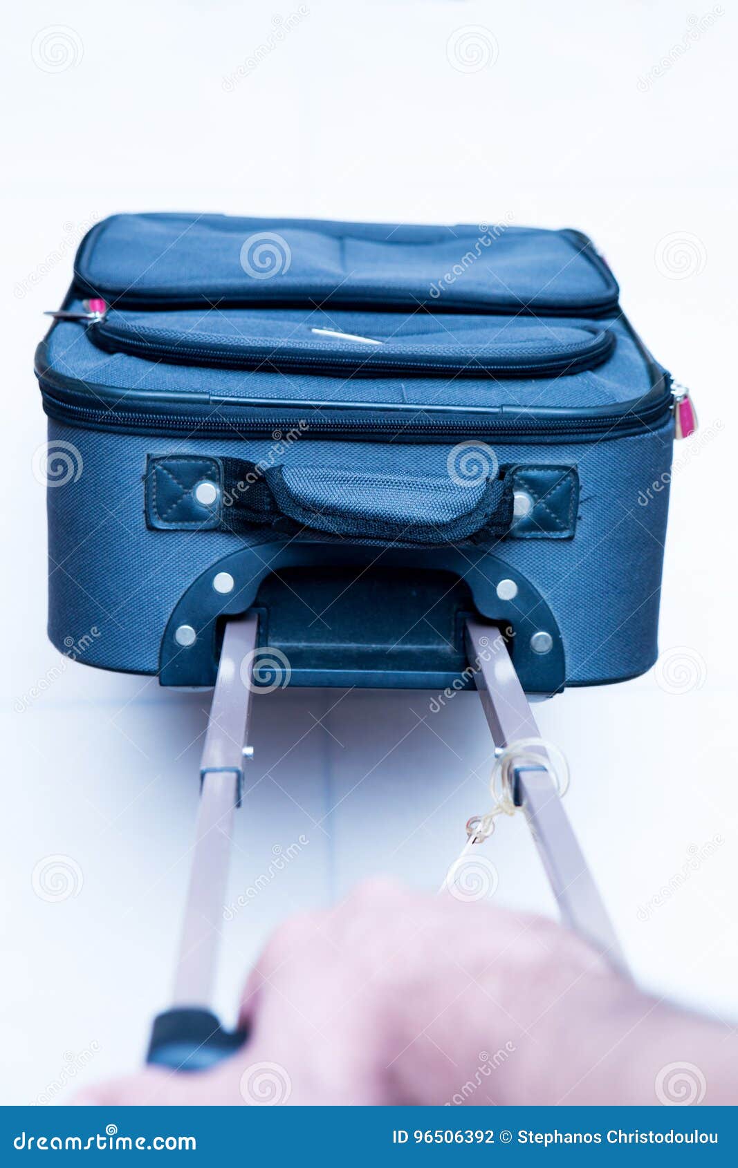 Pulling Luggage in an Airport Stock Photo - Image of carry, motion ...