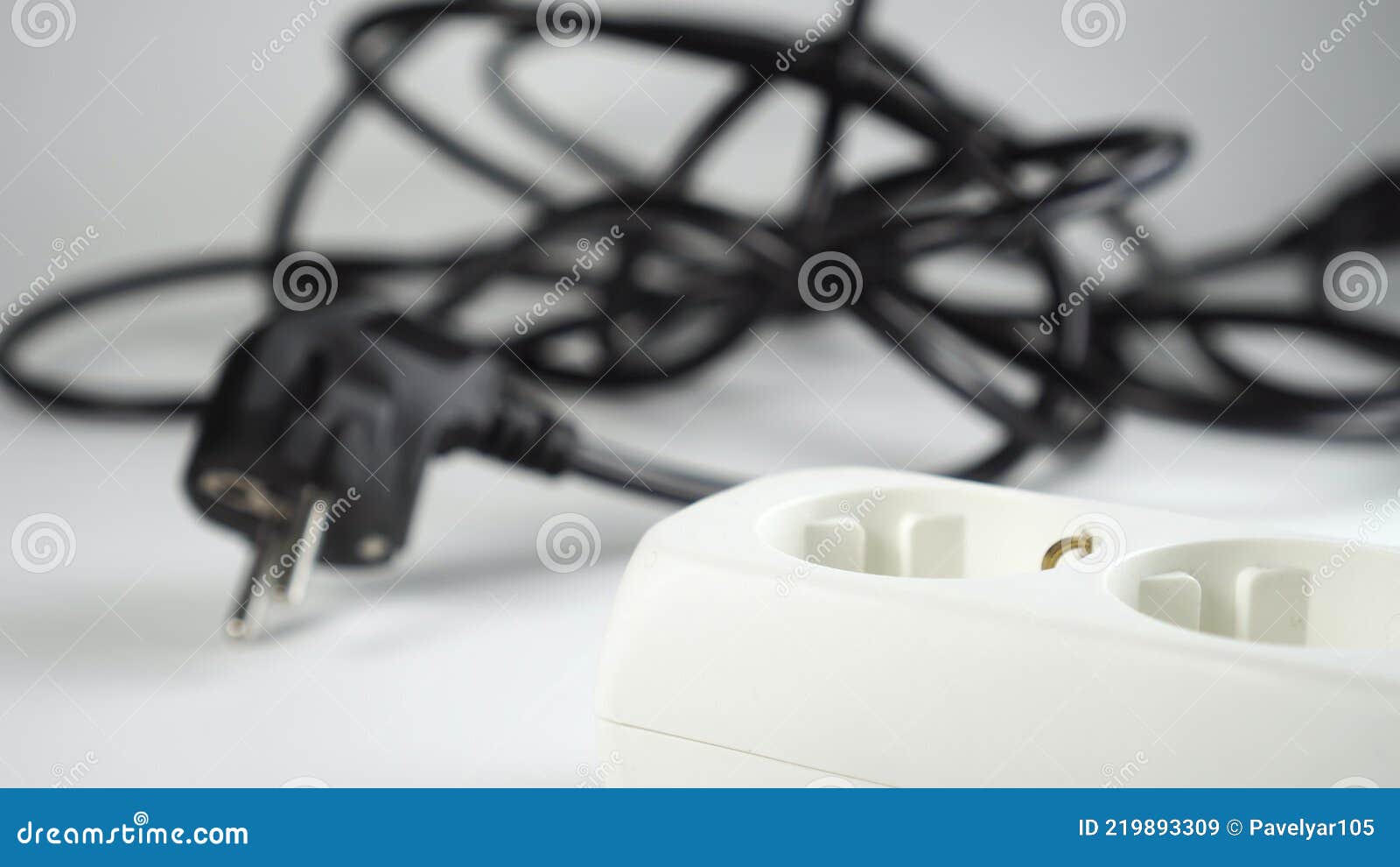 Pulling Out a Euro Banknote from the White Socket of a Home Power Strip ...