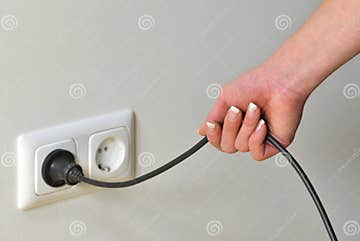 Pulling the plug stock image. Image of hand, outlet, electricity - 12473749