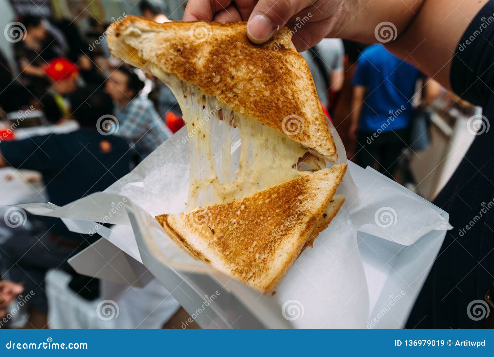 Pulling Separate a Grilled Cheese Toast by Hand with Stretching Cheese ...