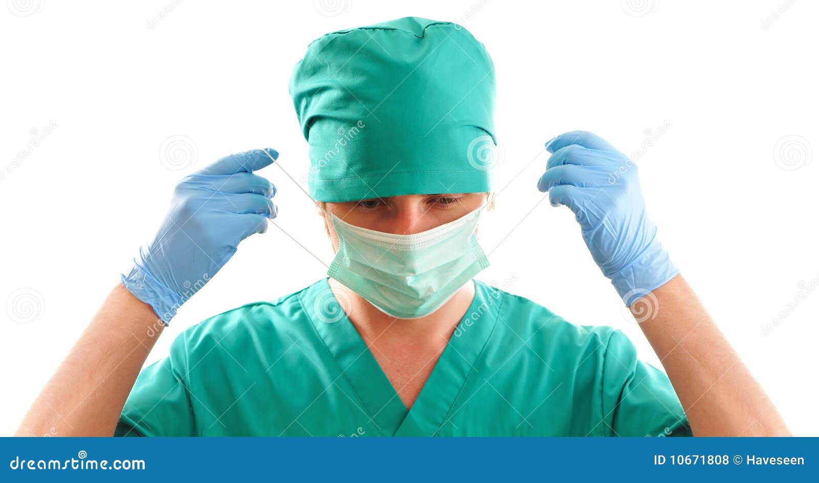 Pulling on surgical mask stock photo. Image of test, examination - 10671808