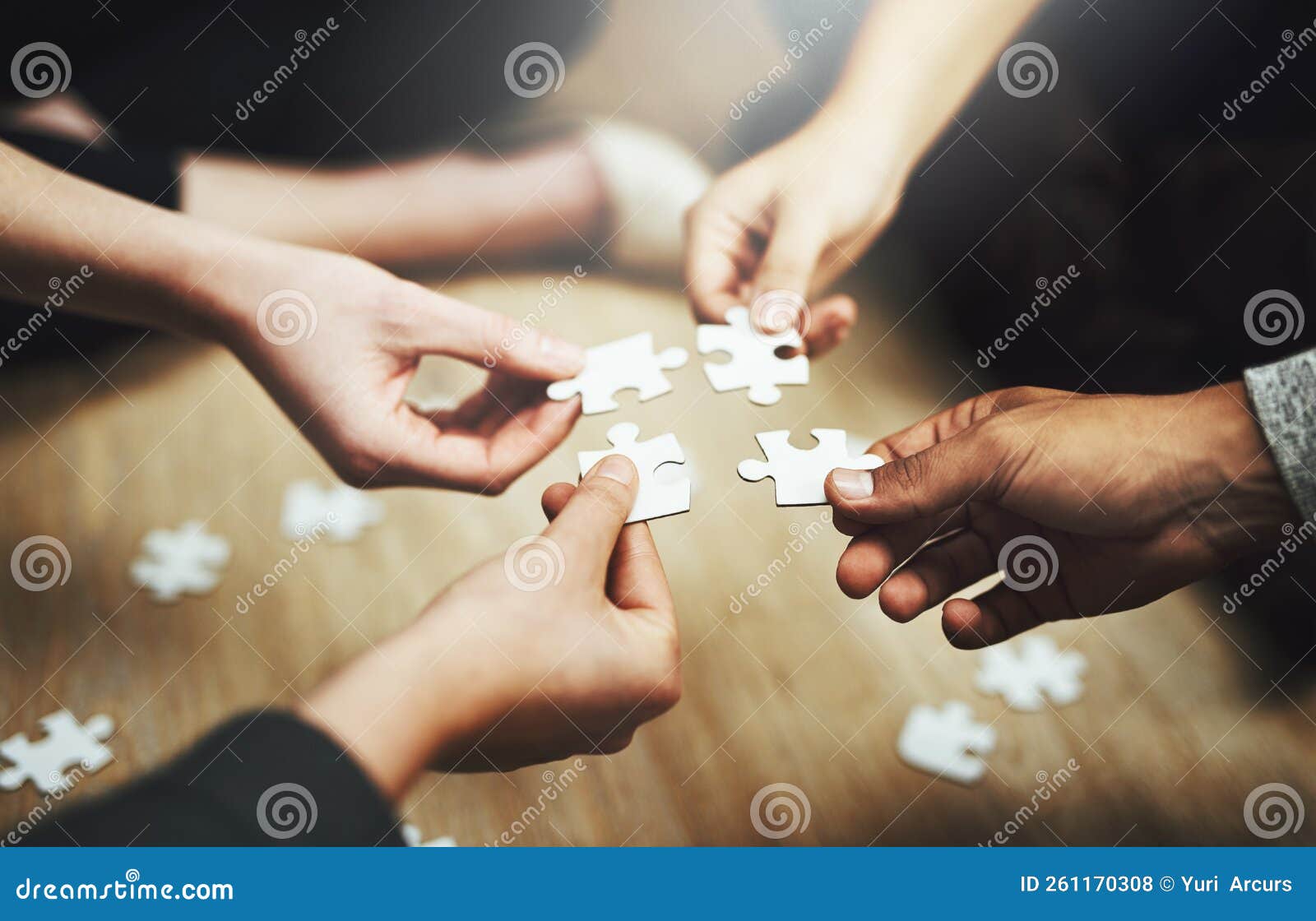 Pulling Together To Solve a Problem. a Group of Unrecognizable People ...