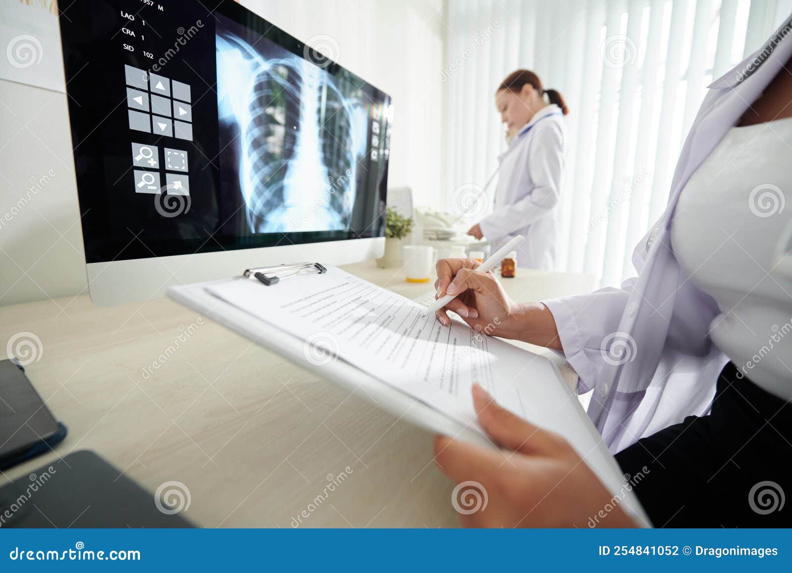 Pulmonologist Checking Lungs X-ray Stock Photo - Image of researcher ...
