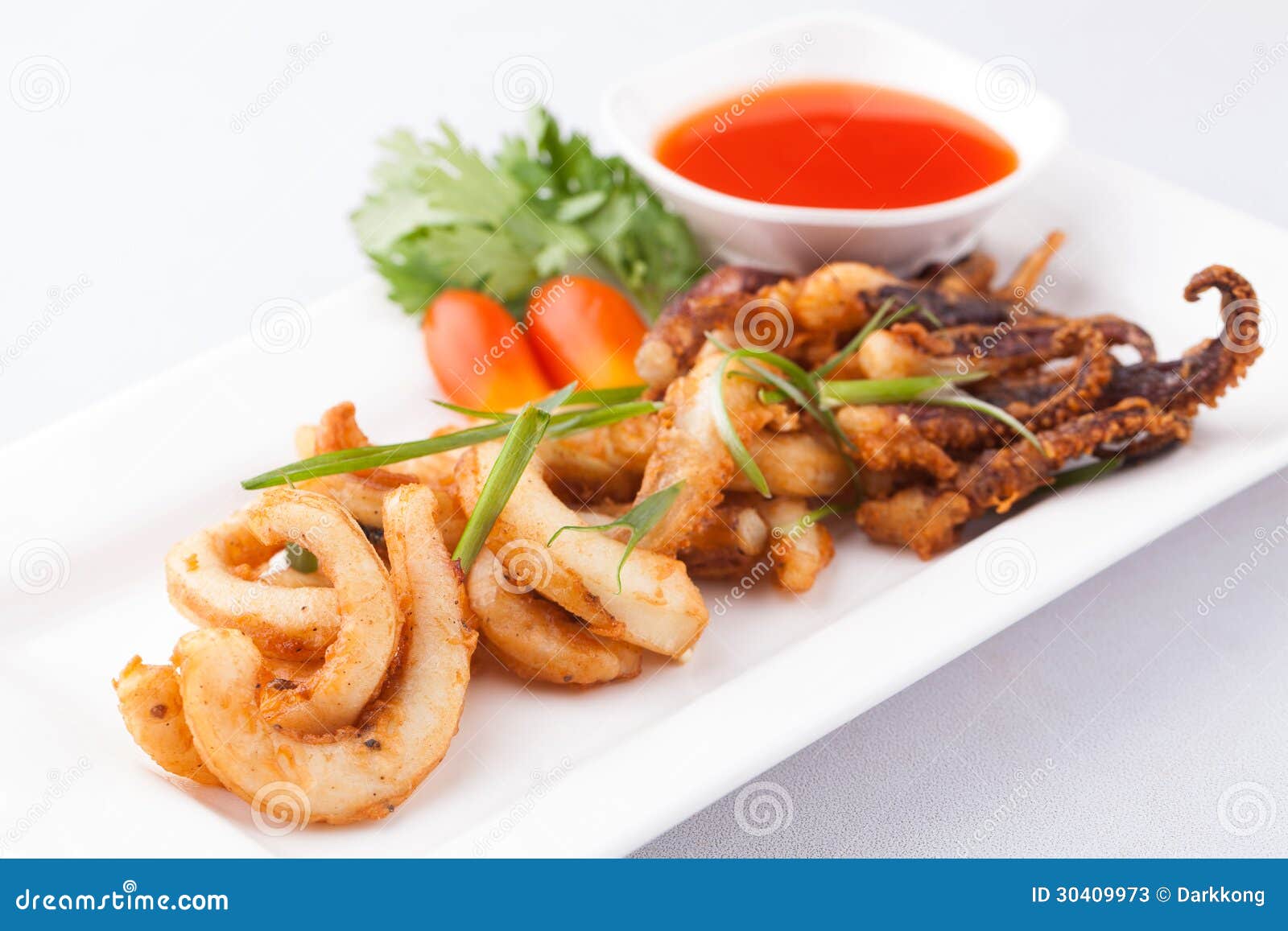 Pulpo Frito Con La Salsa De Chile Imagen de archivo - Imagen de pulpo ...