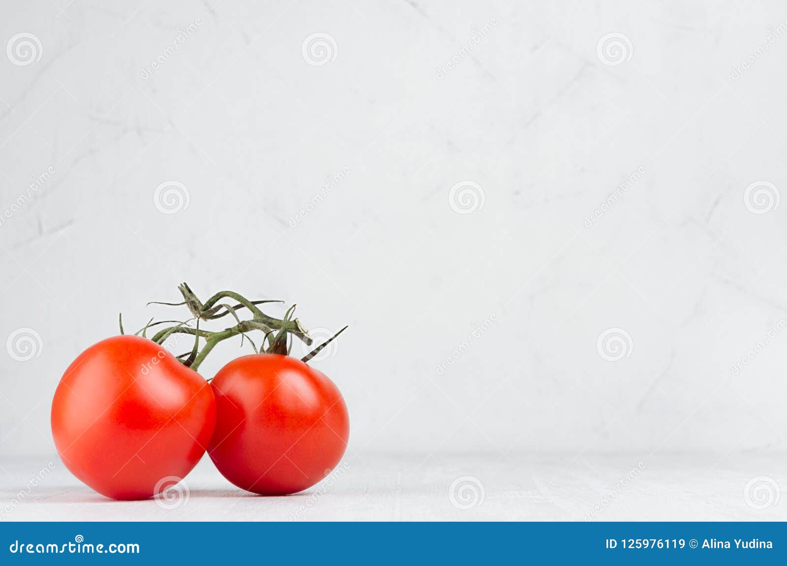 Pulpy Red Tomatoes on Branch in Light Soft White Modern Kitchen ...