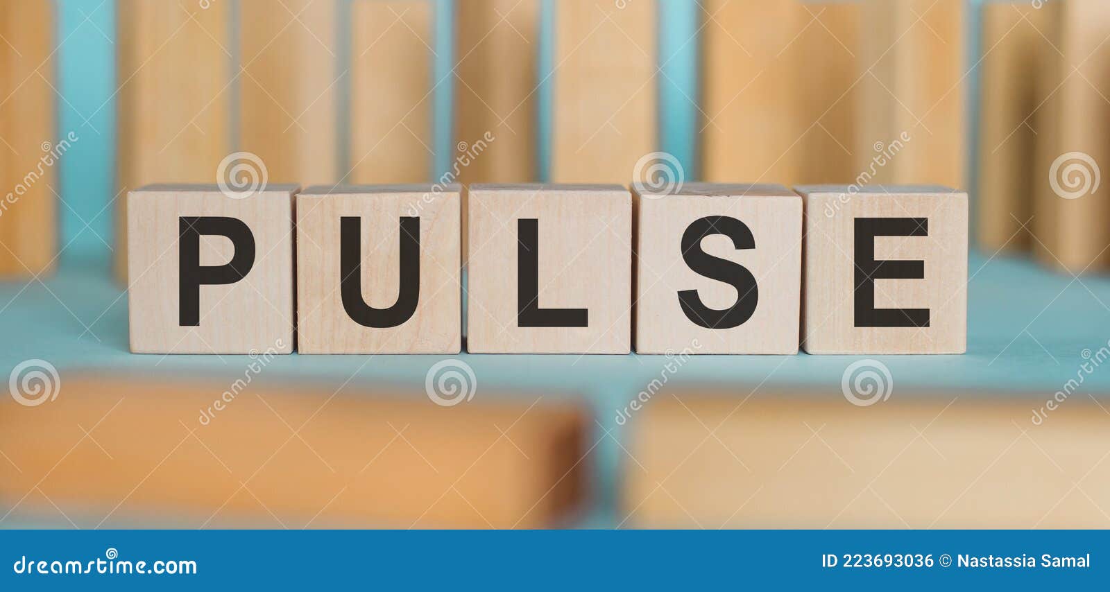 PULSE - Word Written on Wooden Blocks on Light Blue Background Stock ...