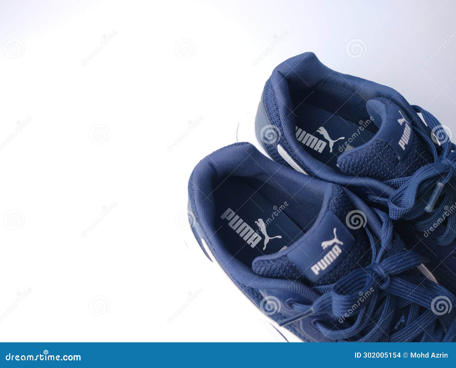 Puma Blue Shoes on a White Background Editorial Stock Image - Image of ...
