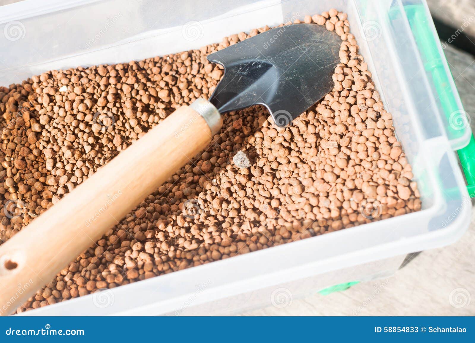 Pumice Pebbles in Bucket and Gardening Tool Stock Image - Image of ...