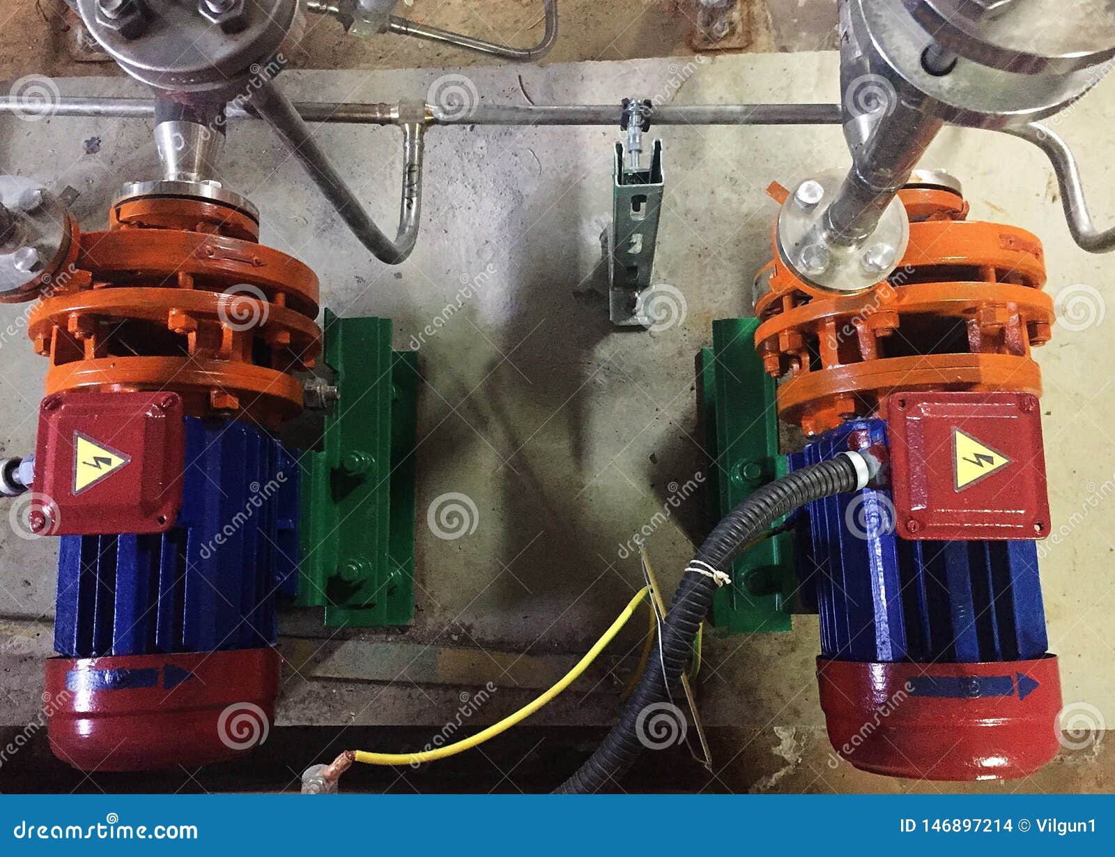 Pump and Engine at an Industrial Facility. Caution the Equipment in ...