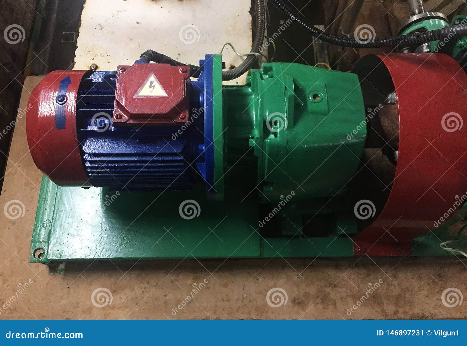 Pump and Engine at an Industrial Facility. Caution the Equipment in ...