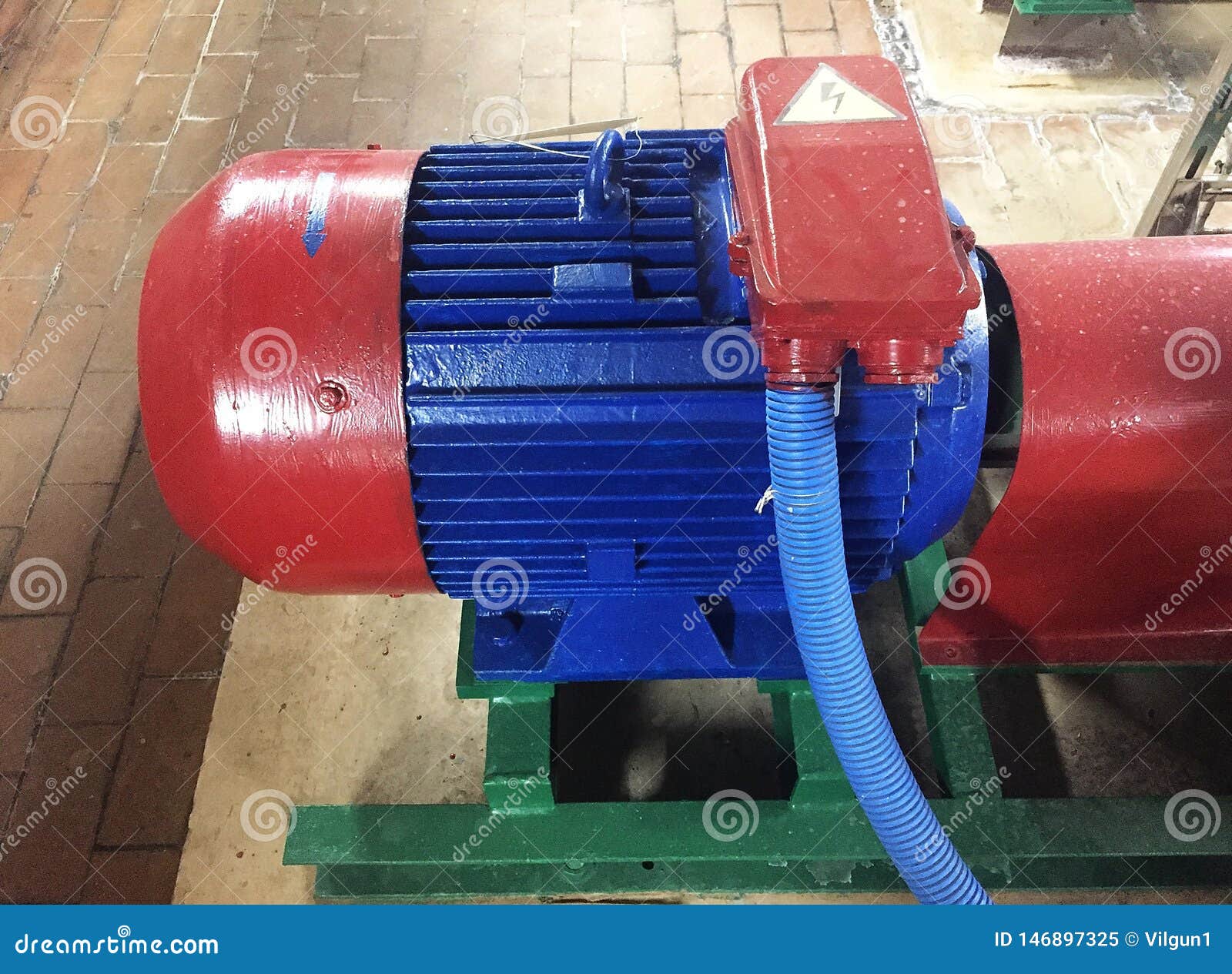 Pump and Engine at an Industrial Facility. Caution the Equipment in ...