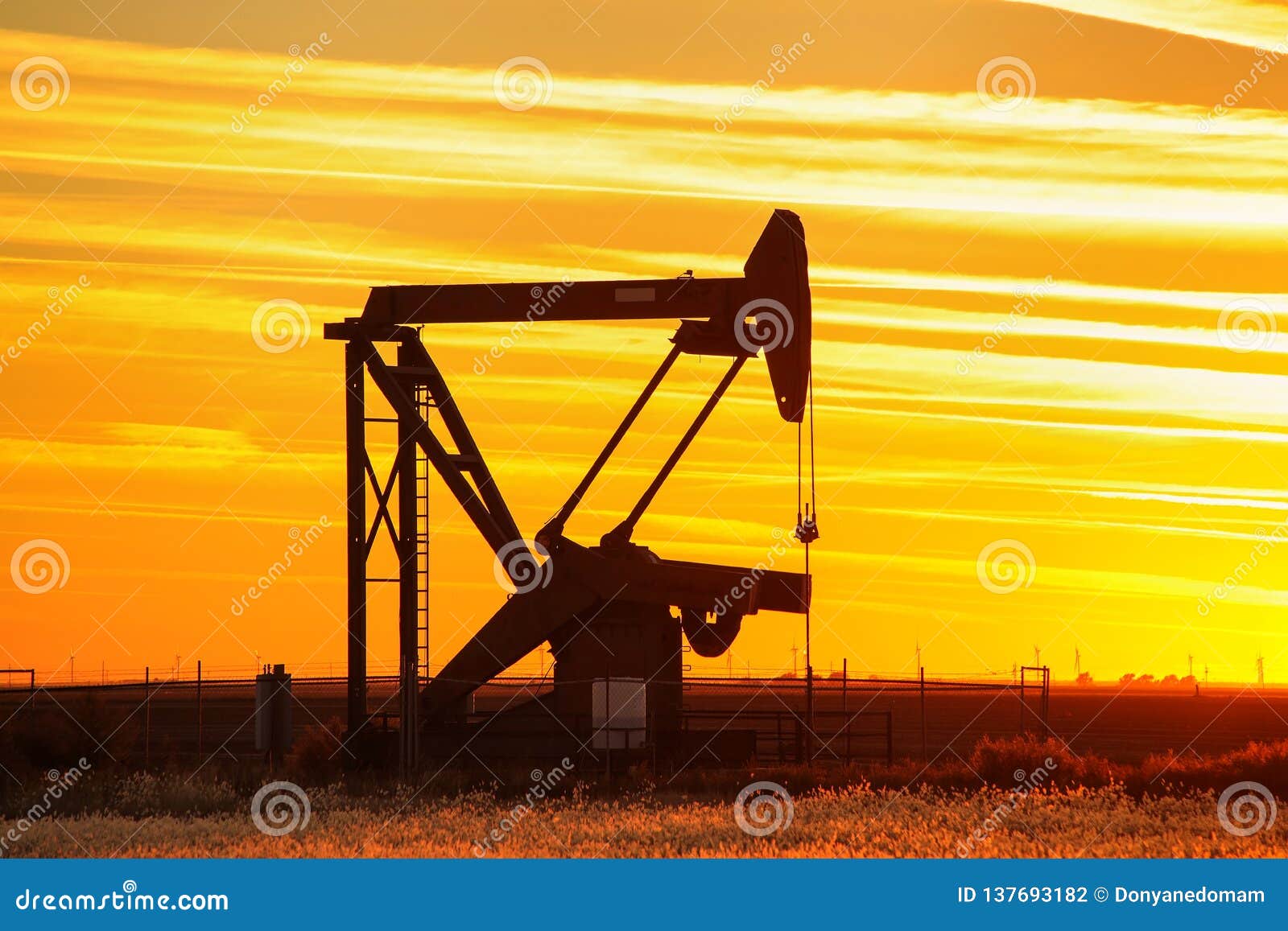 Pump Jack in the Oil Field at Sunset Stock Photo - Image of american ...