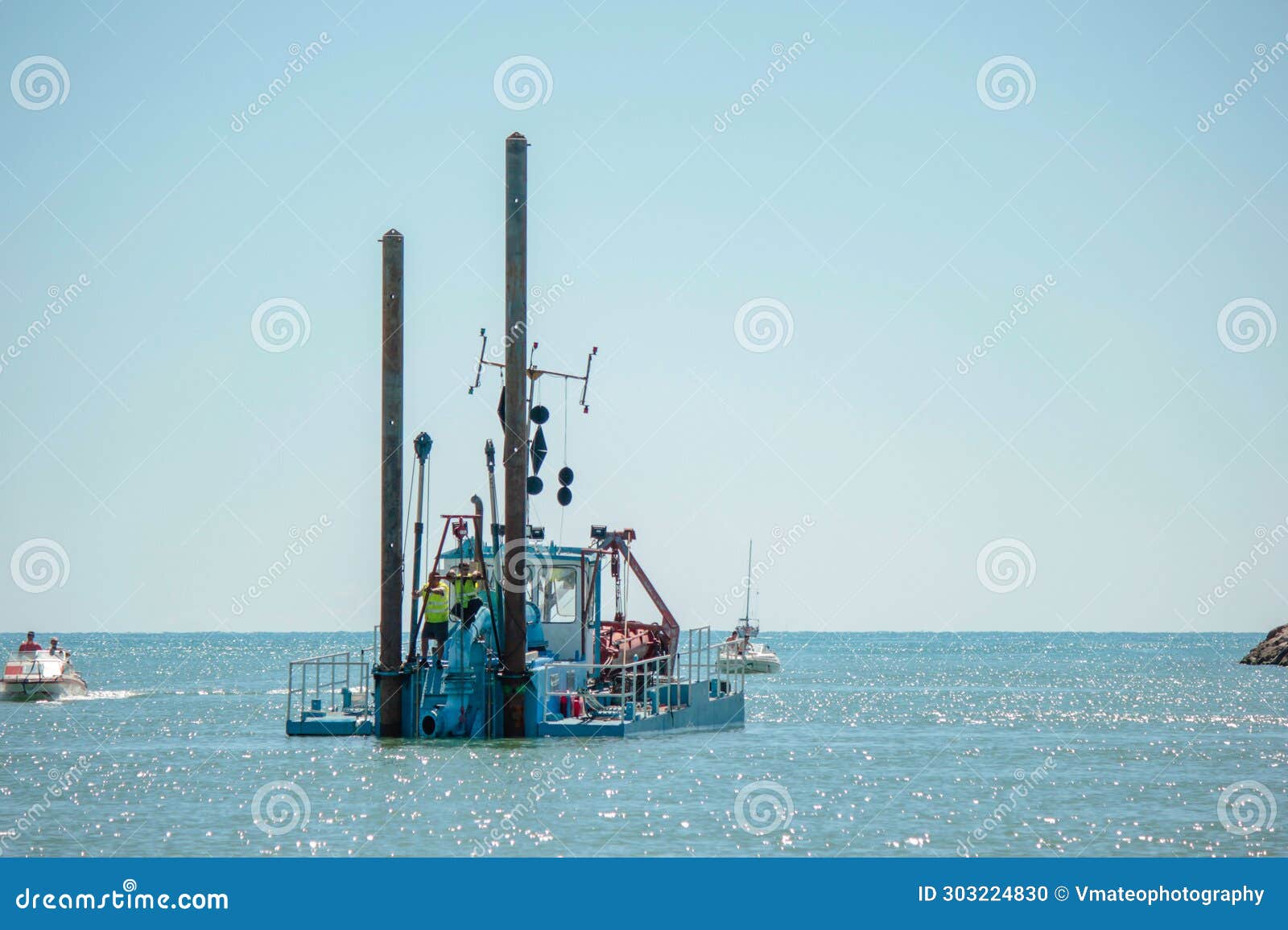 Pump Ship Sailing in the Sea with Clear Sky and Crew on Board Stock ...
