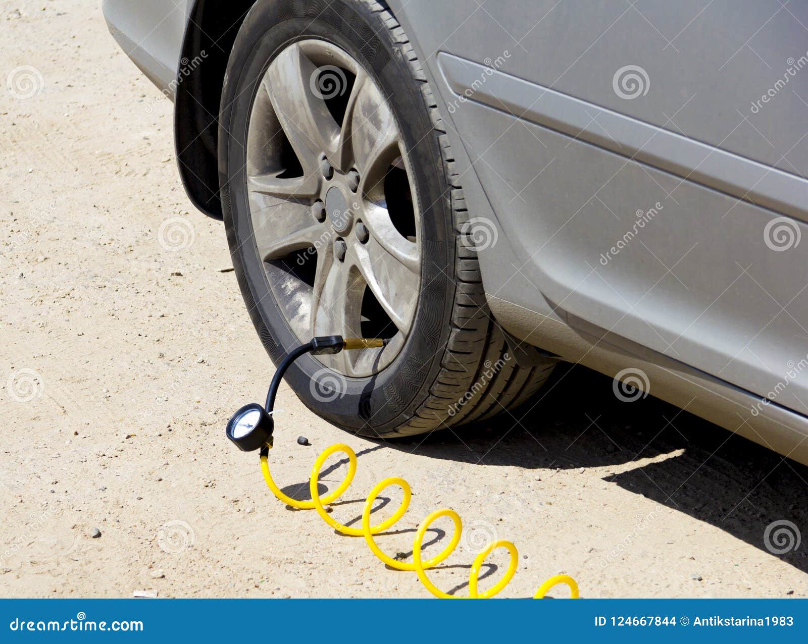 Pump the wheels on the car stock photo. Image of breakdown - 124667844