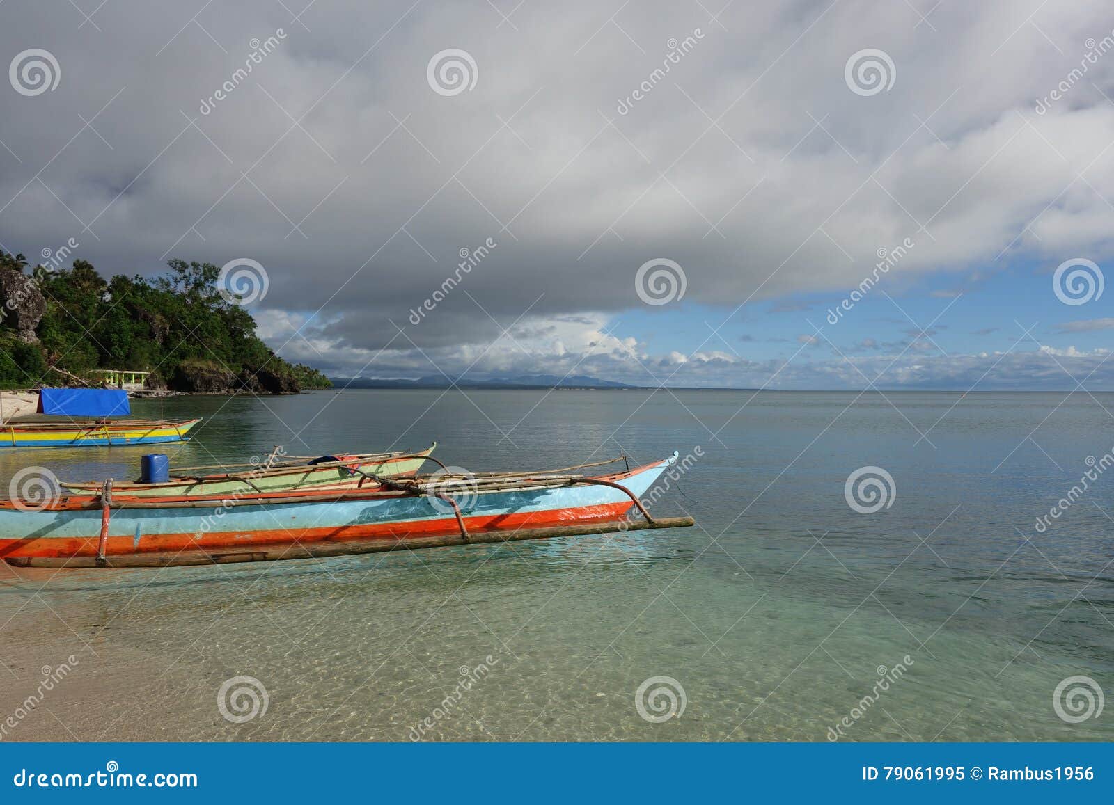 Pumpboats, Clouds and Calm Seashore Stock Image - Image of sunsets ...