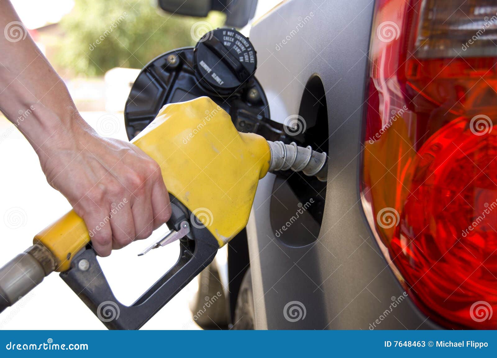 Pumping Gas or Petrol stock image. Image of gasoline, colorful - 7648463