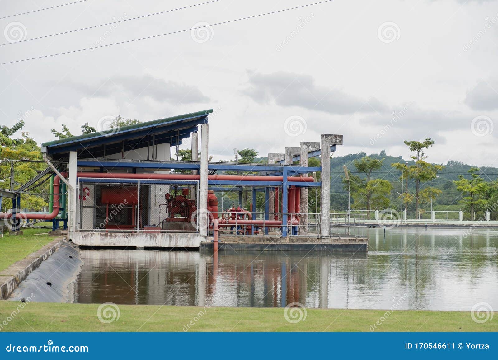 Pumping in Large Factories with a Forested Stock Image - Image of ...