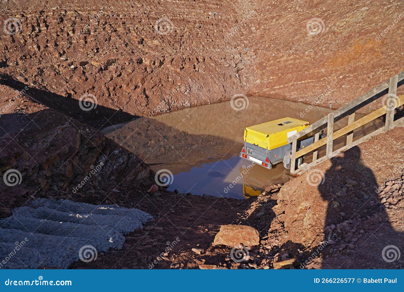 Pumping Out Water in the Excavation Pit Stock Image - Image of ...