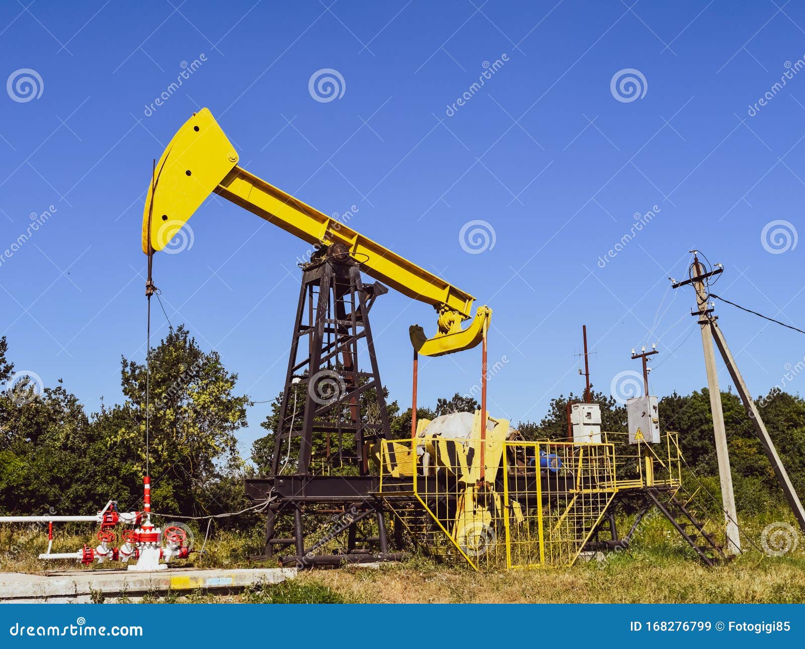 Pumping Unit As the Oil Pump Installed on a Well Stock Image - Image of ...