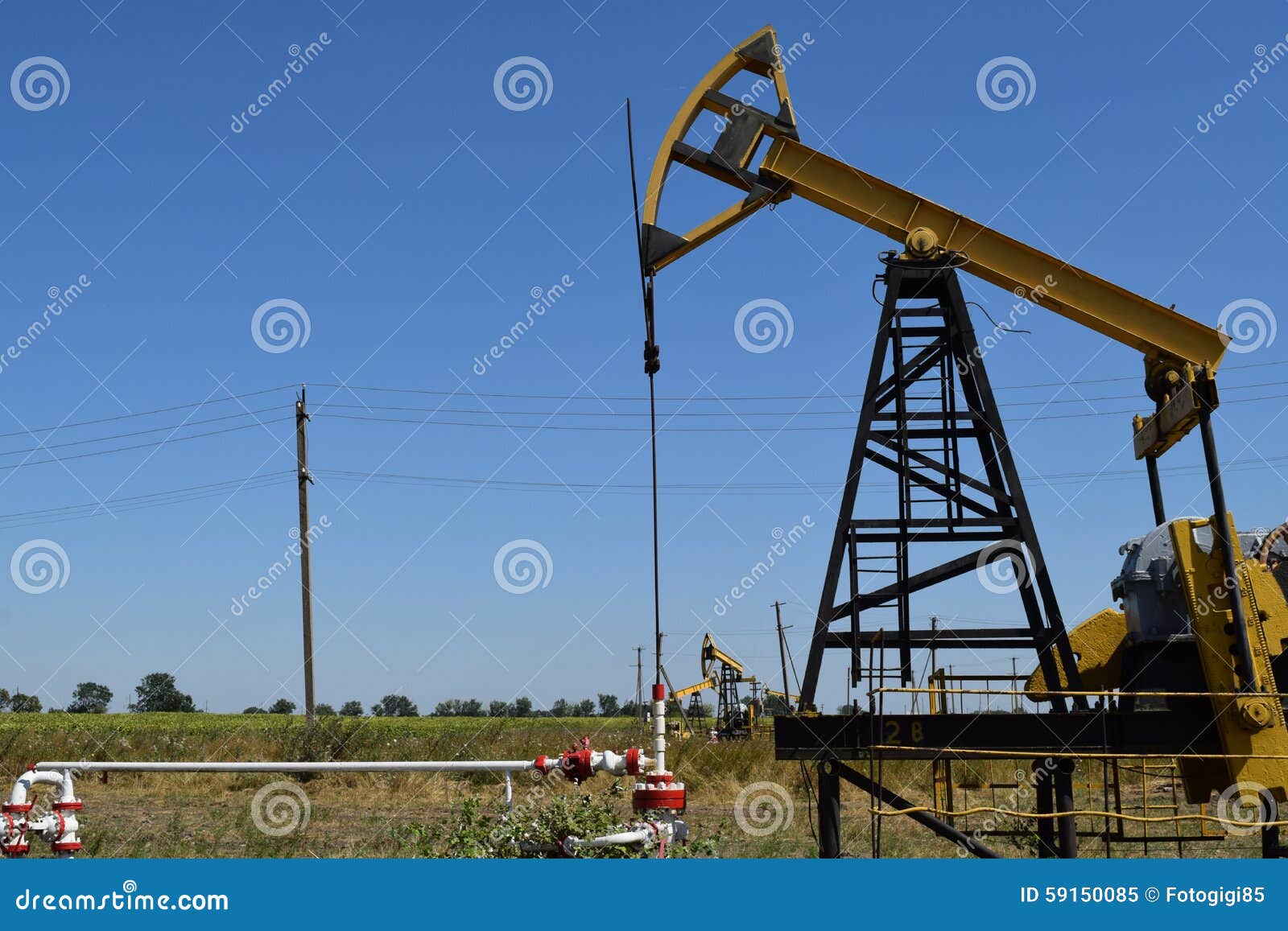 Pumping Unit As the Oil Pump Installed on a Well Stock Image - Image of ...