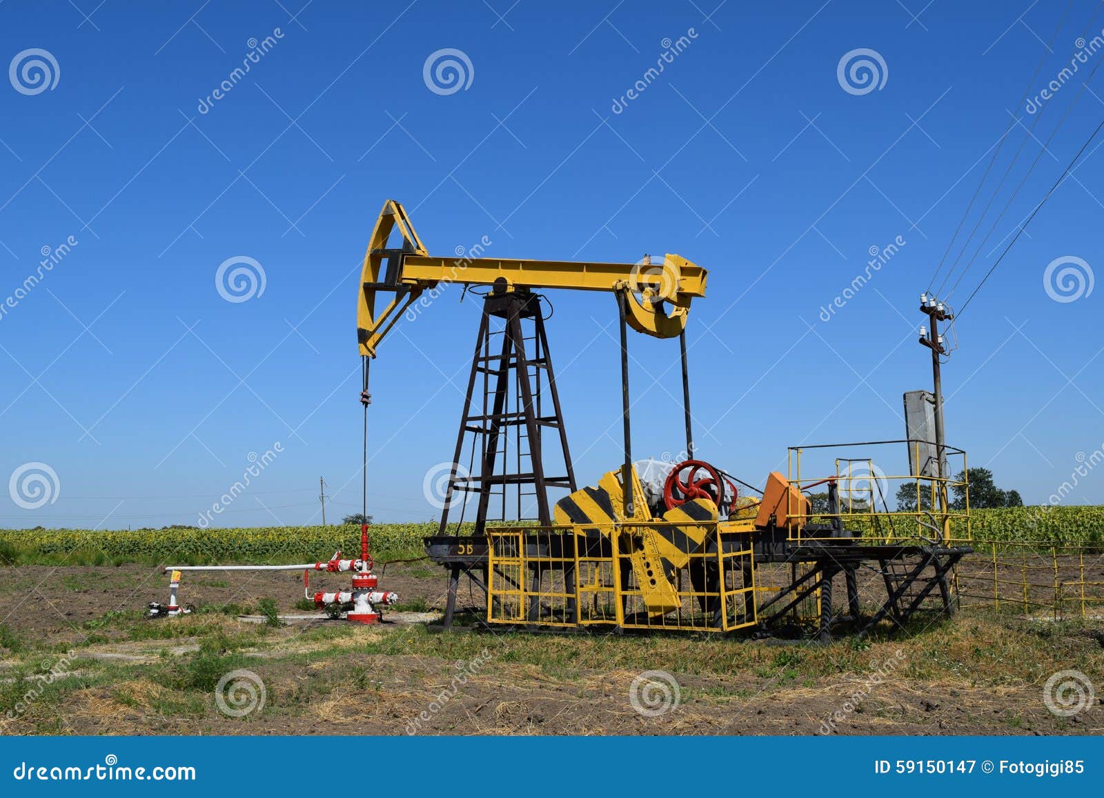 Pumping Unit As the Oil Pump Installed on a Well Stock Image - Image of ...