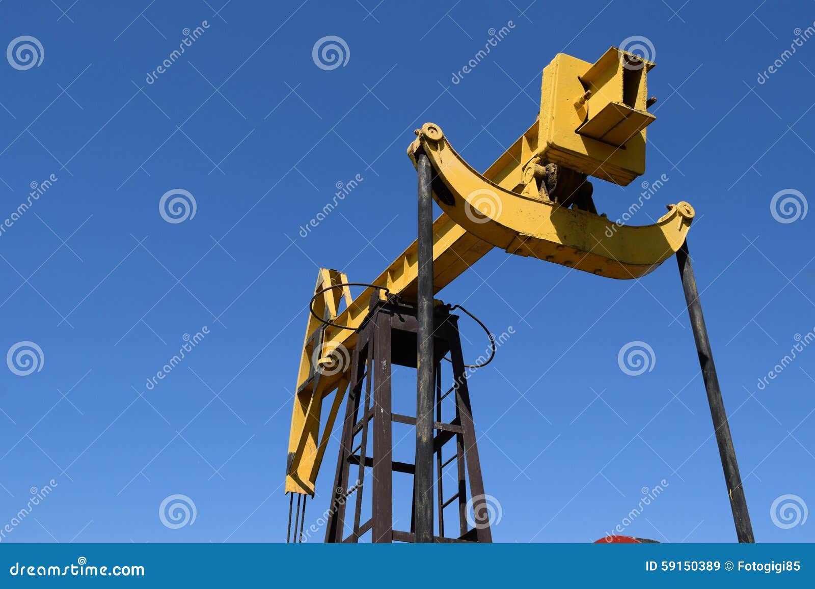 Pumping Unit As the Oil Pump Installed on a Well Stock Image - Image of ...