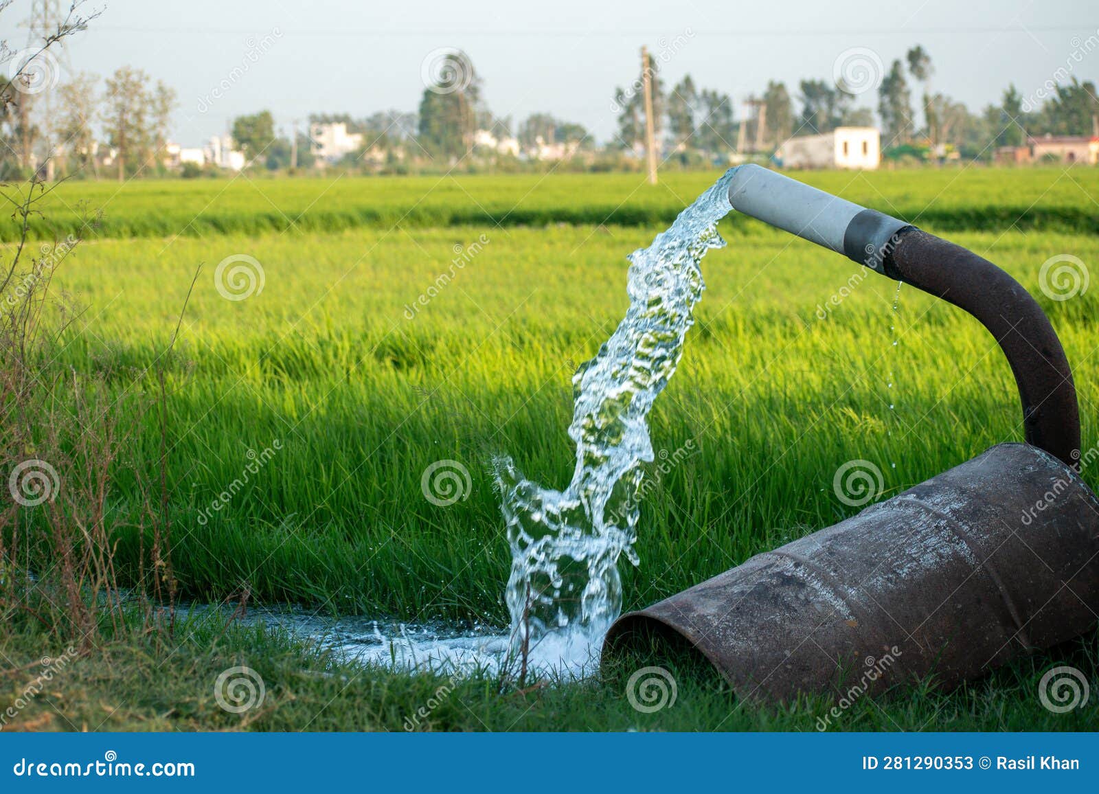 Pumping Water from the Ground To Flow into the Rice Fields Stock Image ...