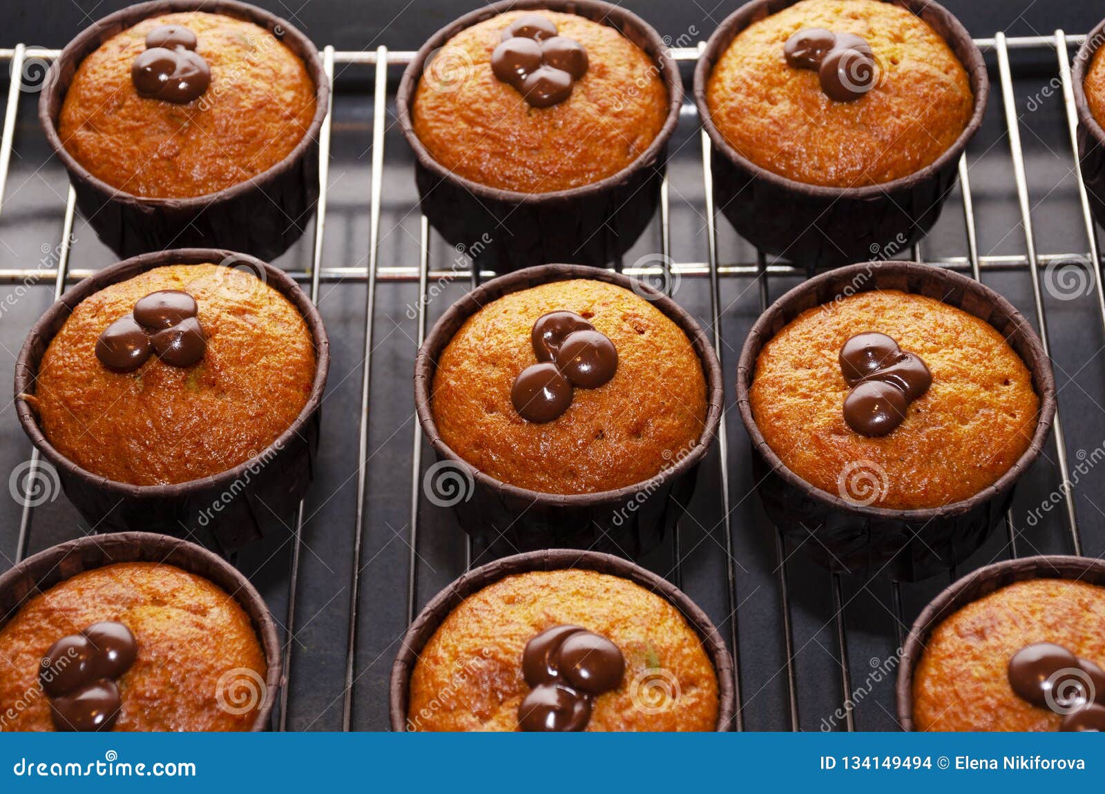 Pumpkin Muffins with Chocolate on the Rack for Cooling Stock Photo ...