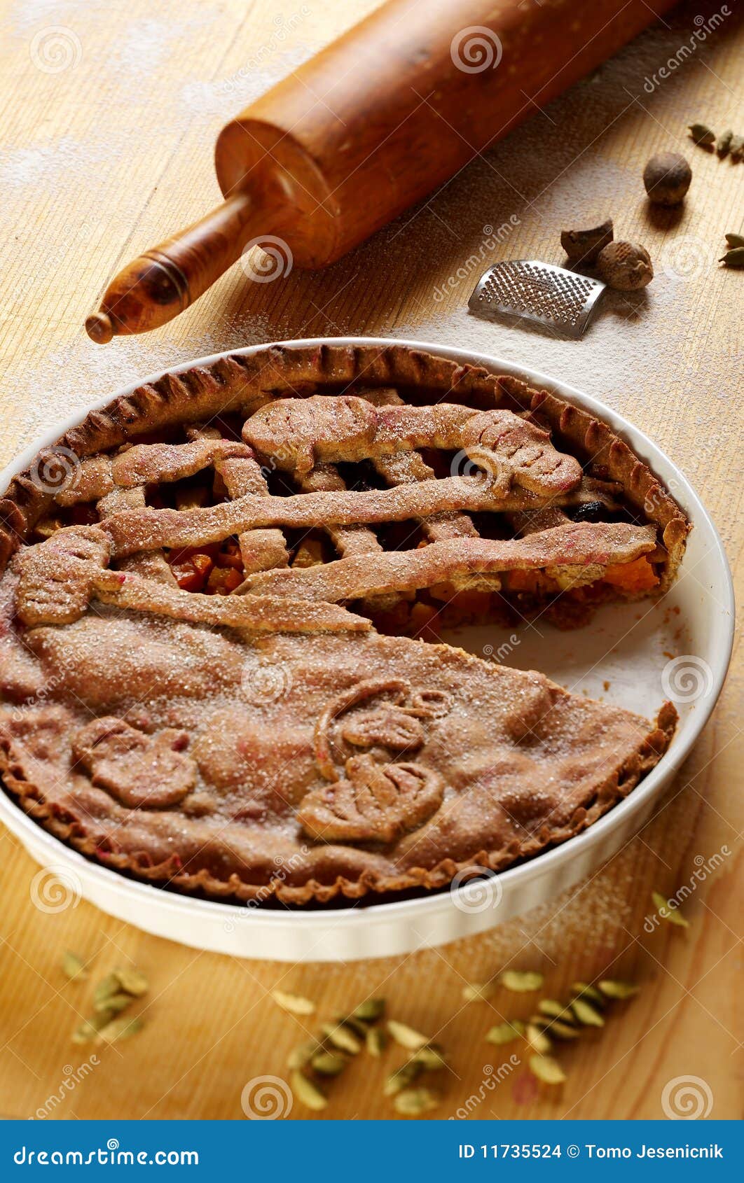 Pumpkin pie with raisins stock photo. Image of round - 11735524