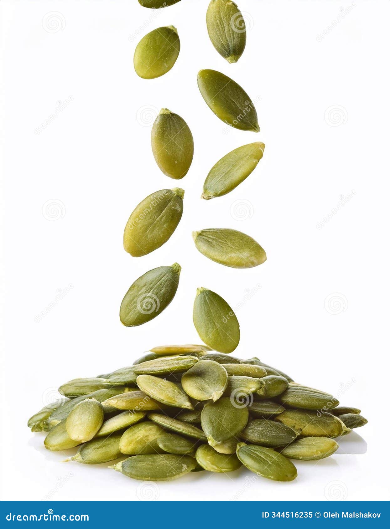 Pumpkin Seeds Falling on a Pile on White Background Stock Image - Image ...