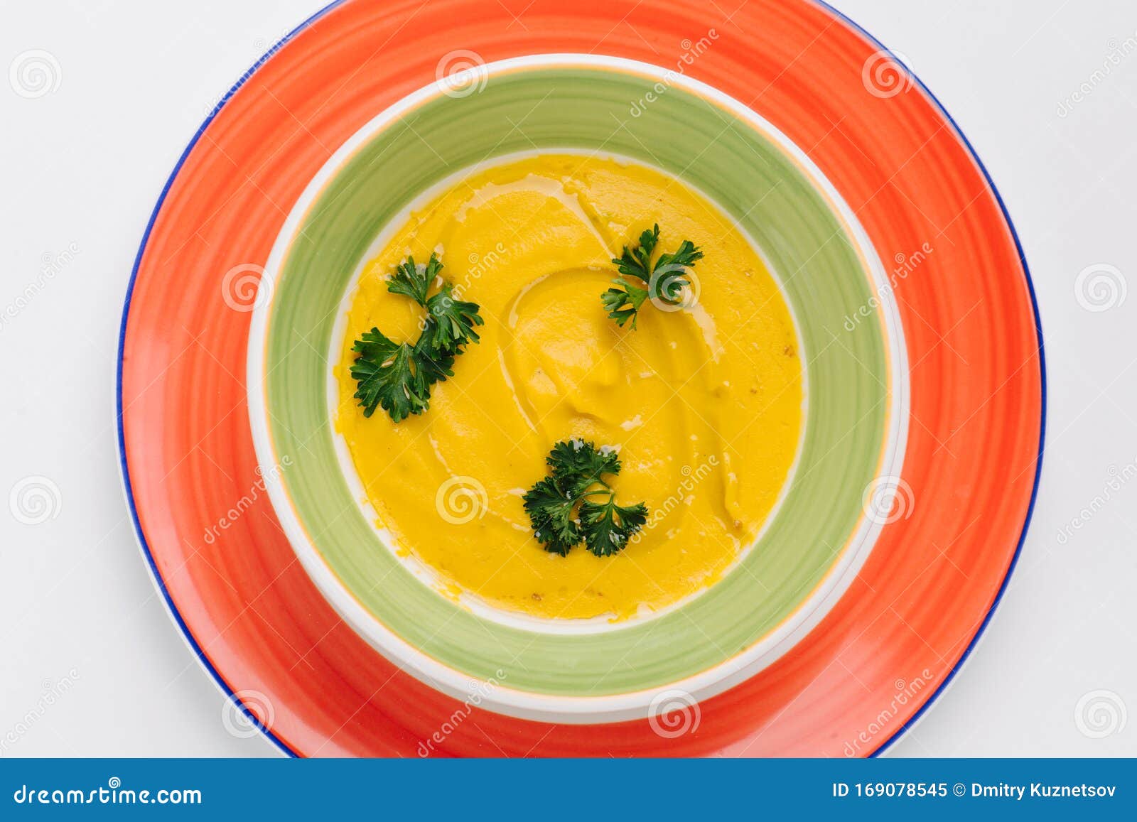 Pumpkin Soup with Parsley Leaves Served on a Platter. Top View Stock ...