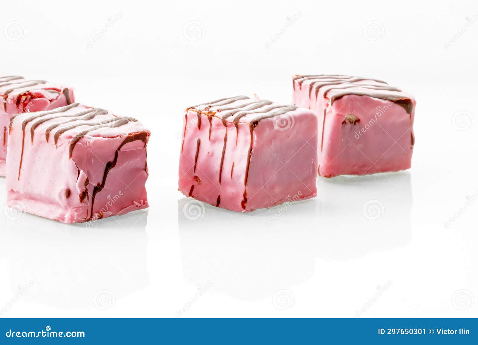 Punch Cakes Covered with Pink Icing on White Background Stock Image ...