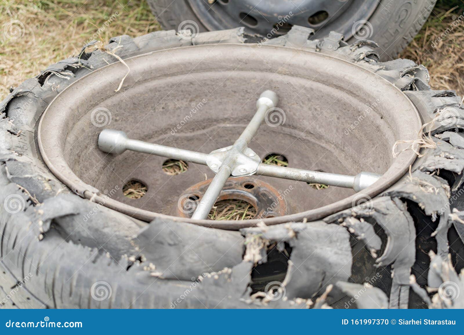 The Punched and Torn Tire of a Wheel Stock Photo - Image of accident ...