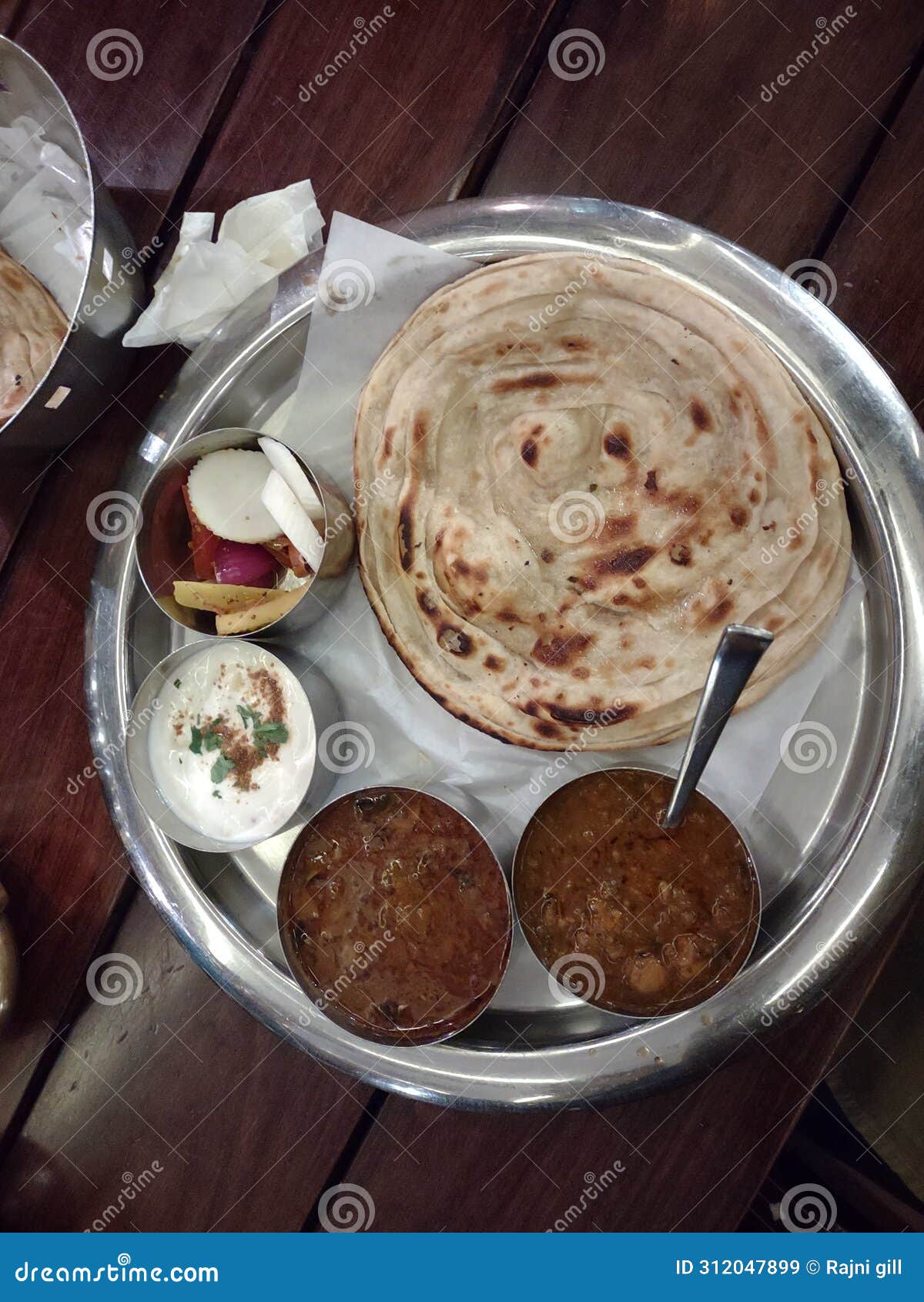 Punjabi Thali - Paratha Flatbread Served With Accompaniments Royalty ...
