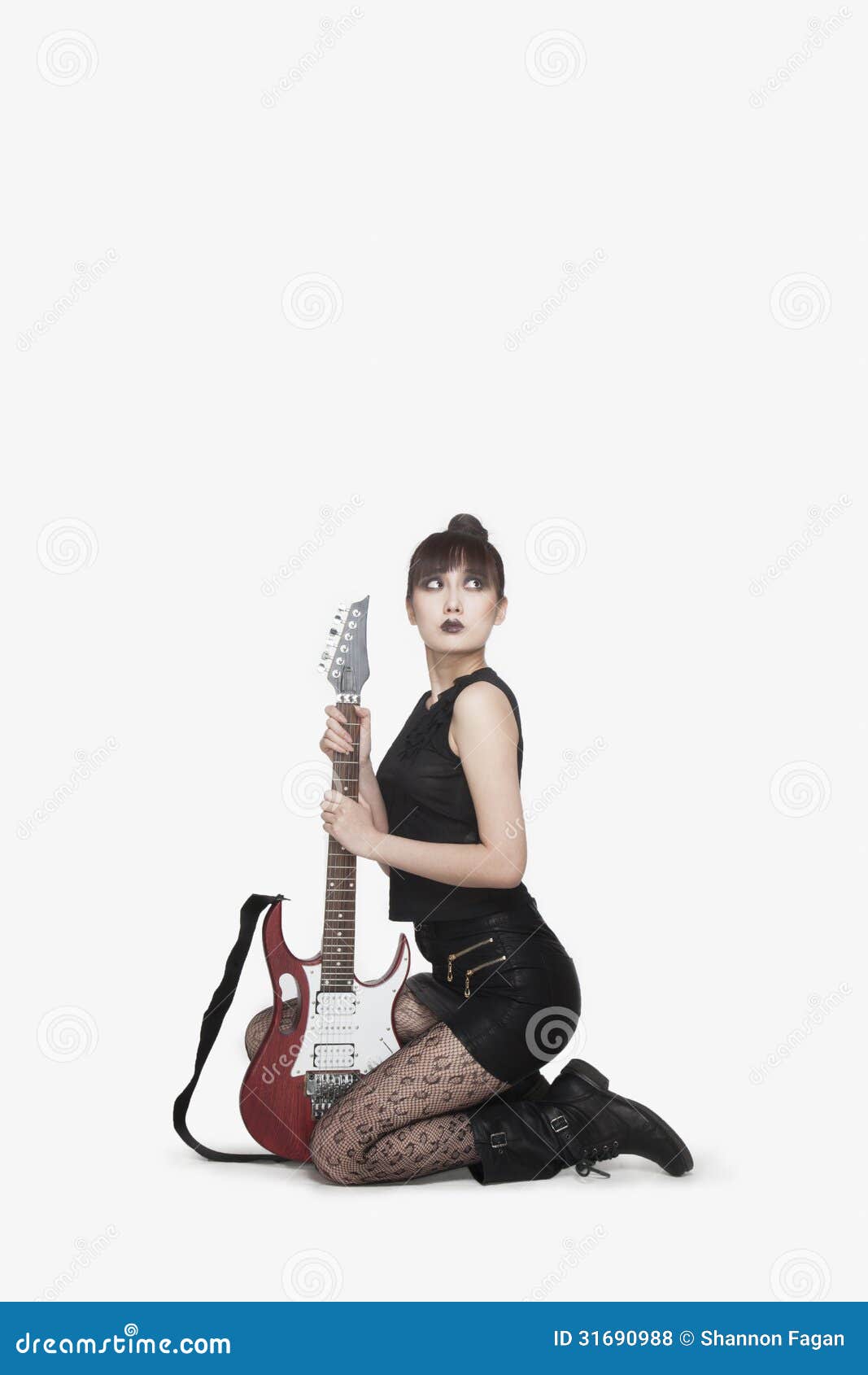 Punk Rocker Kneeling with Guitar Stock Photo - Image of hipster, city ...