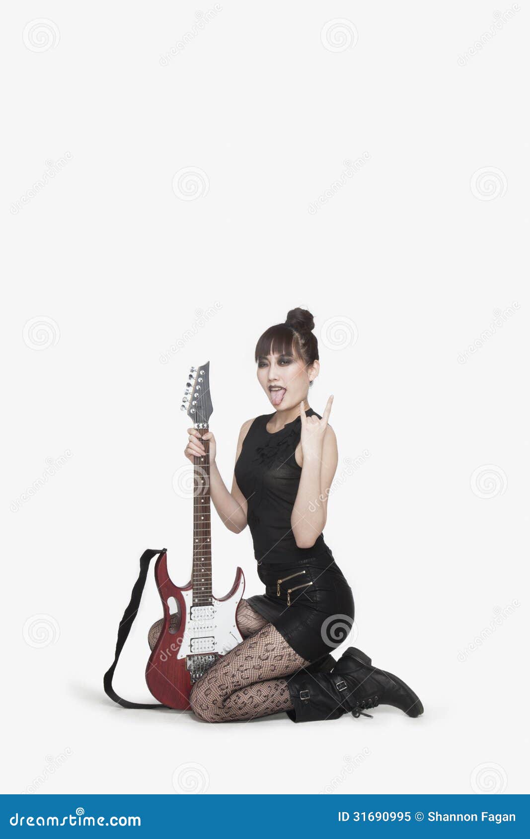 Punk Rocker Kneeling with Guitar Stock Image - Image of brown, arts ...