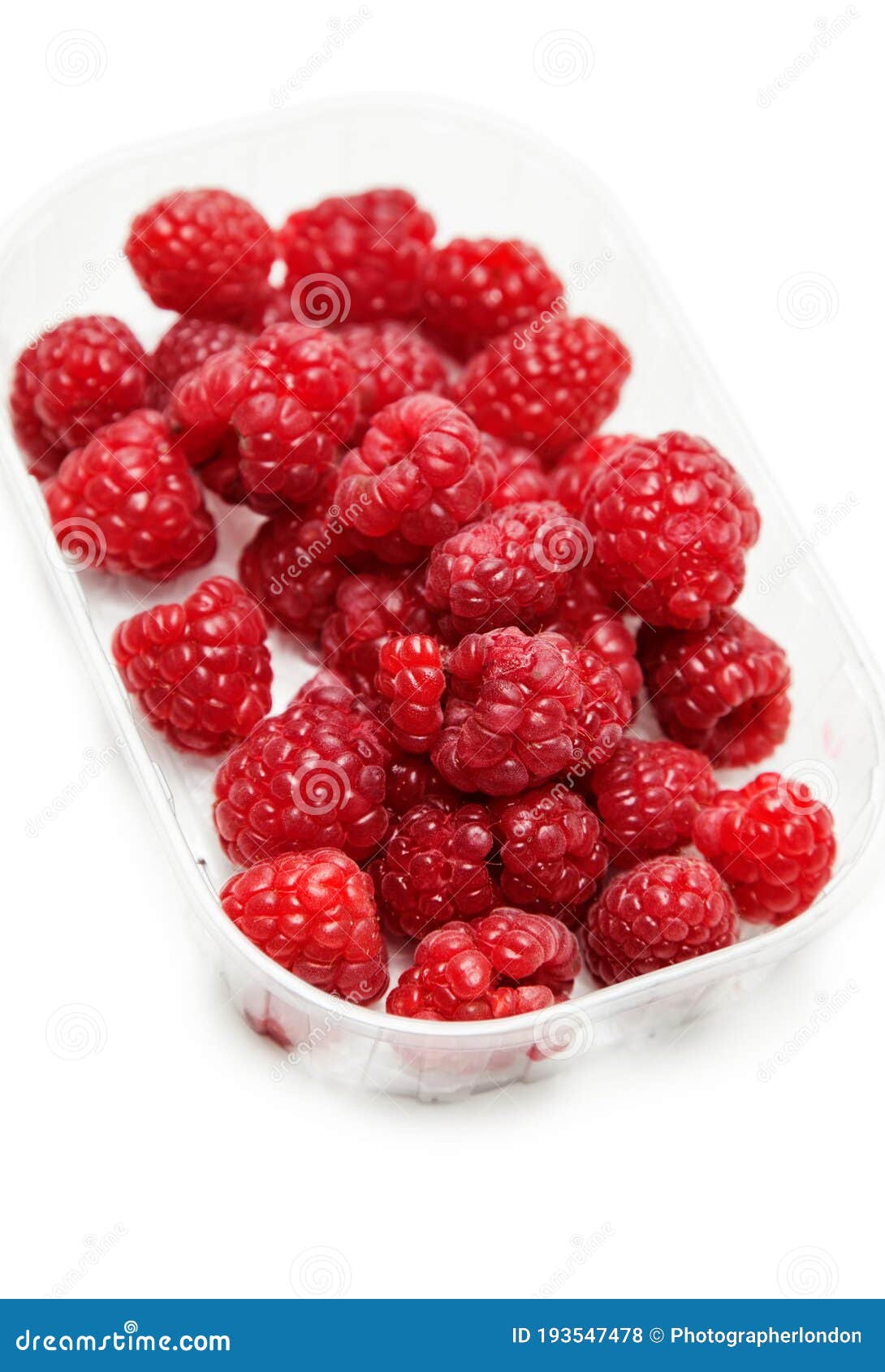 Studio Shot of Punnet of Raspberries Stock Photo - Image of food, farm ...