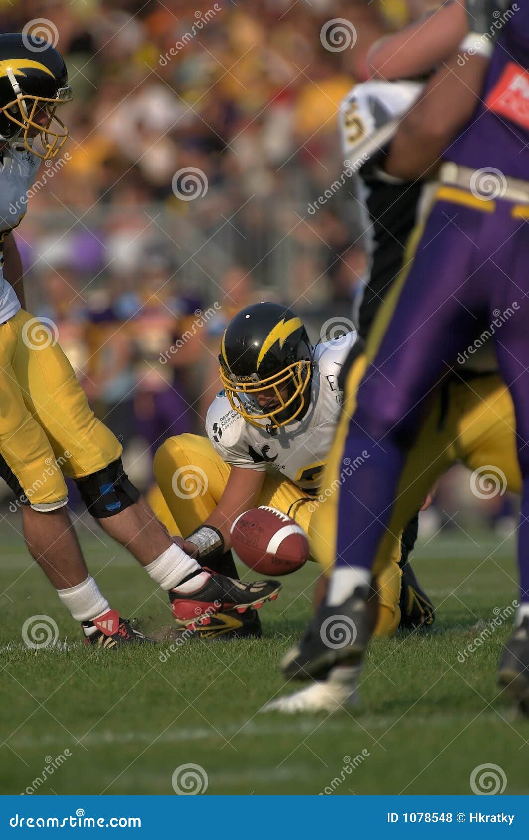 Punting the ball stock photo. Image of athletes, helmet - 1078548