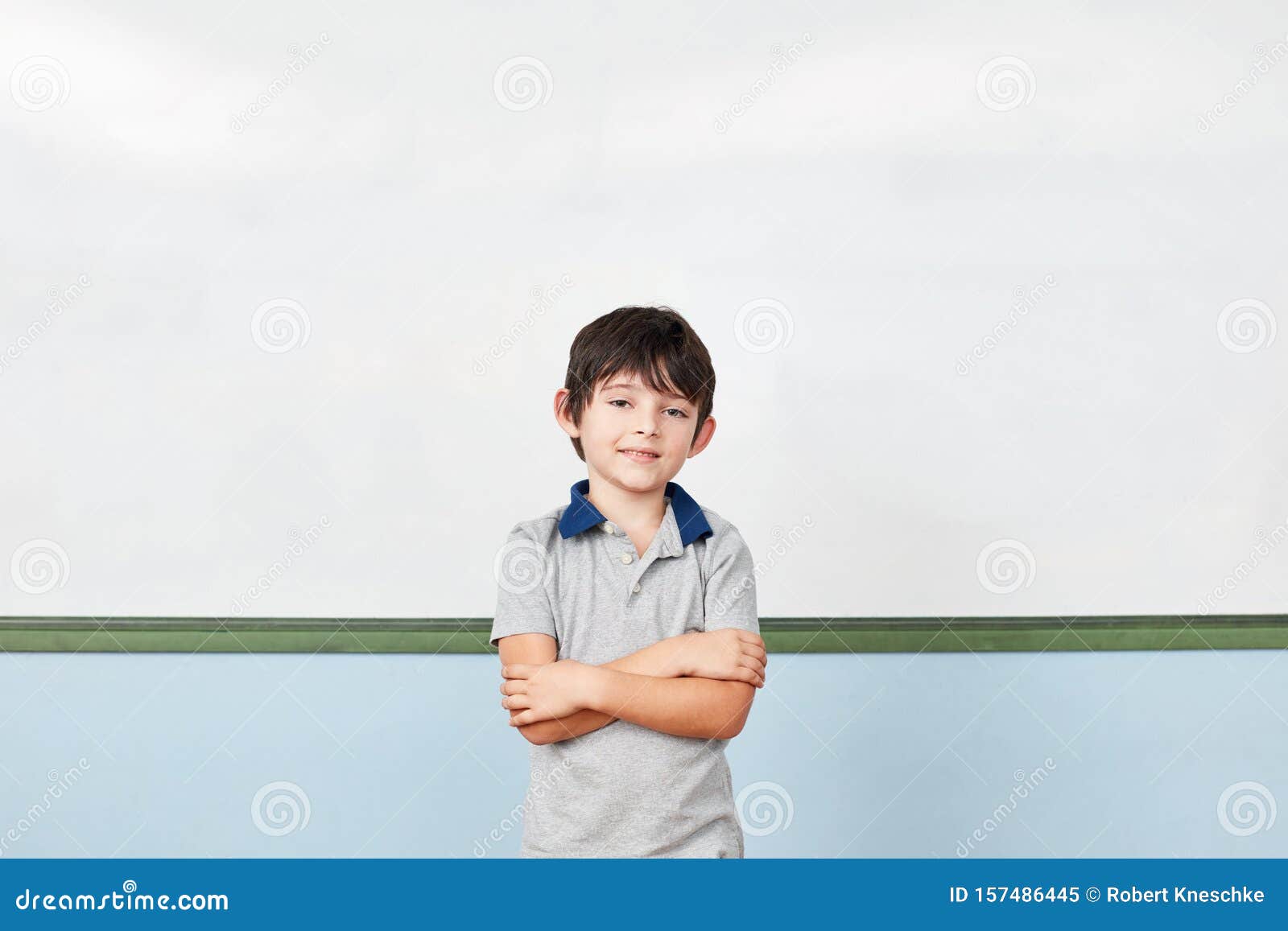 Pupil with Crossed Arms in Front of Blackboard Stock Image - Image of ...
