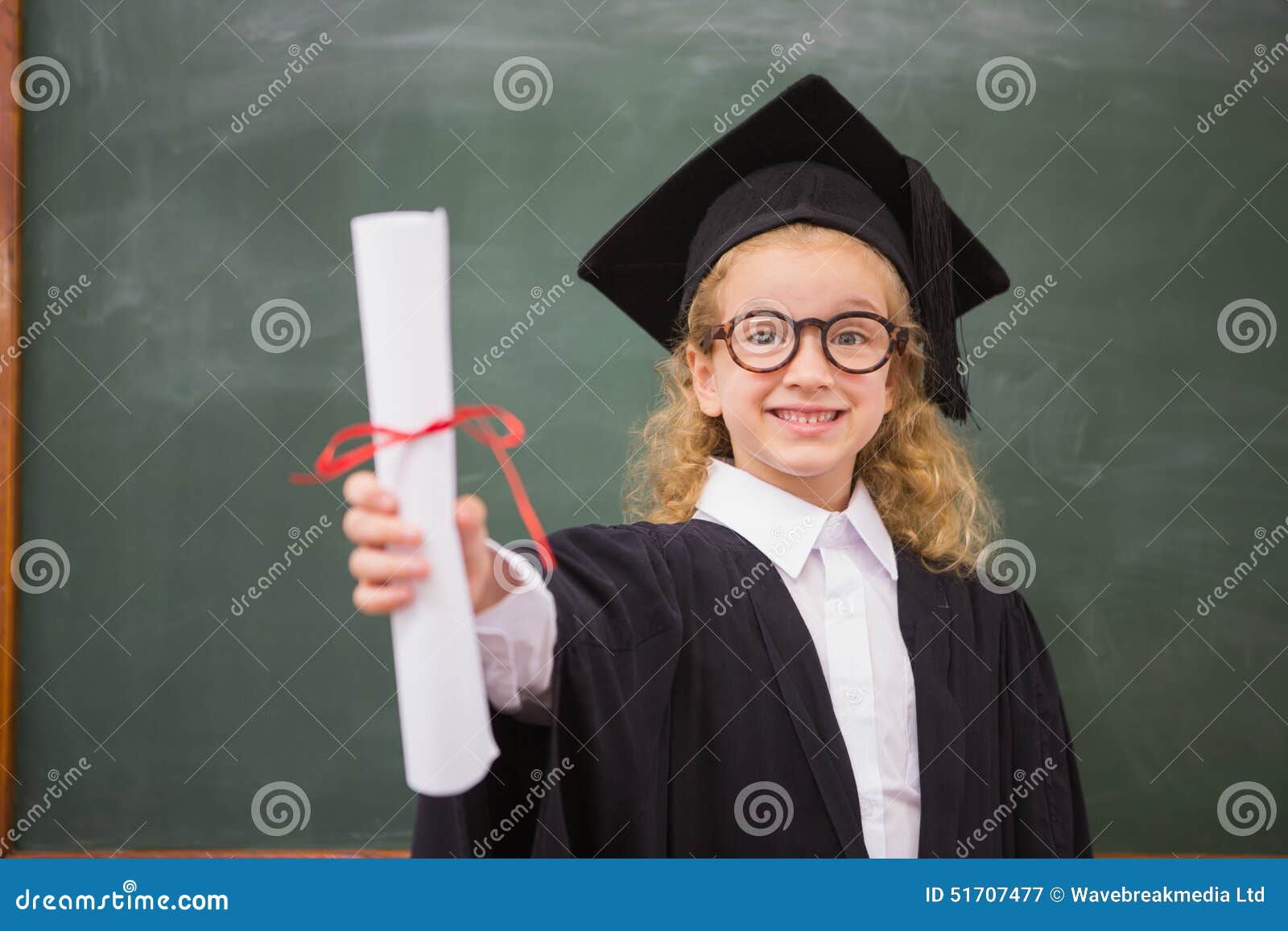 Pupil with Graduation Robe and Holding Her Diploma Stock Image - Image ...