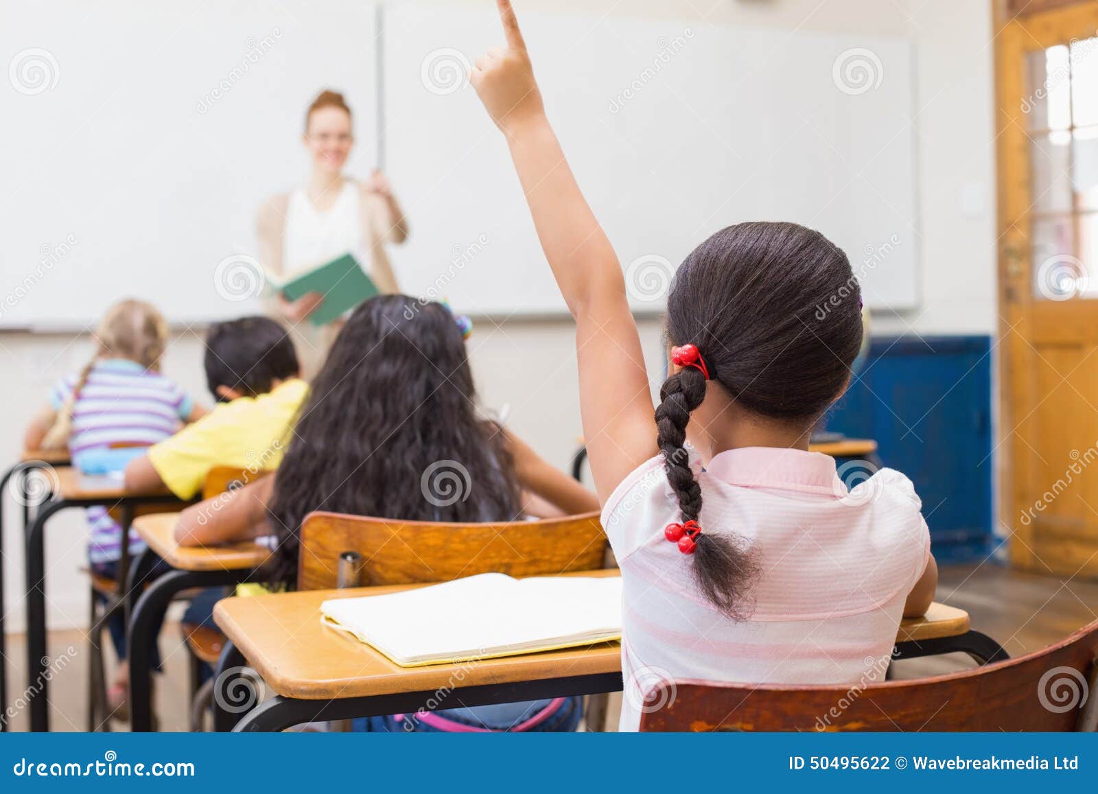 Pupil Raising Hand in Classroom Stock Photo - Image of communication ...