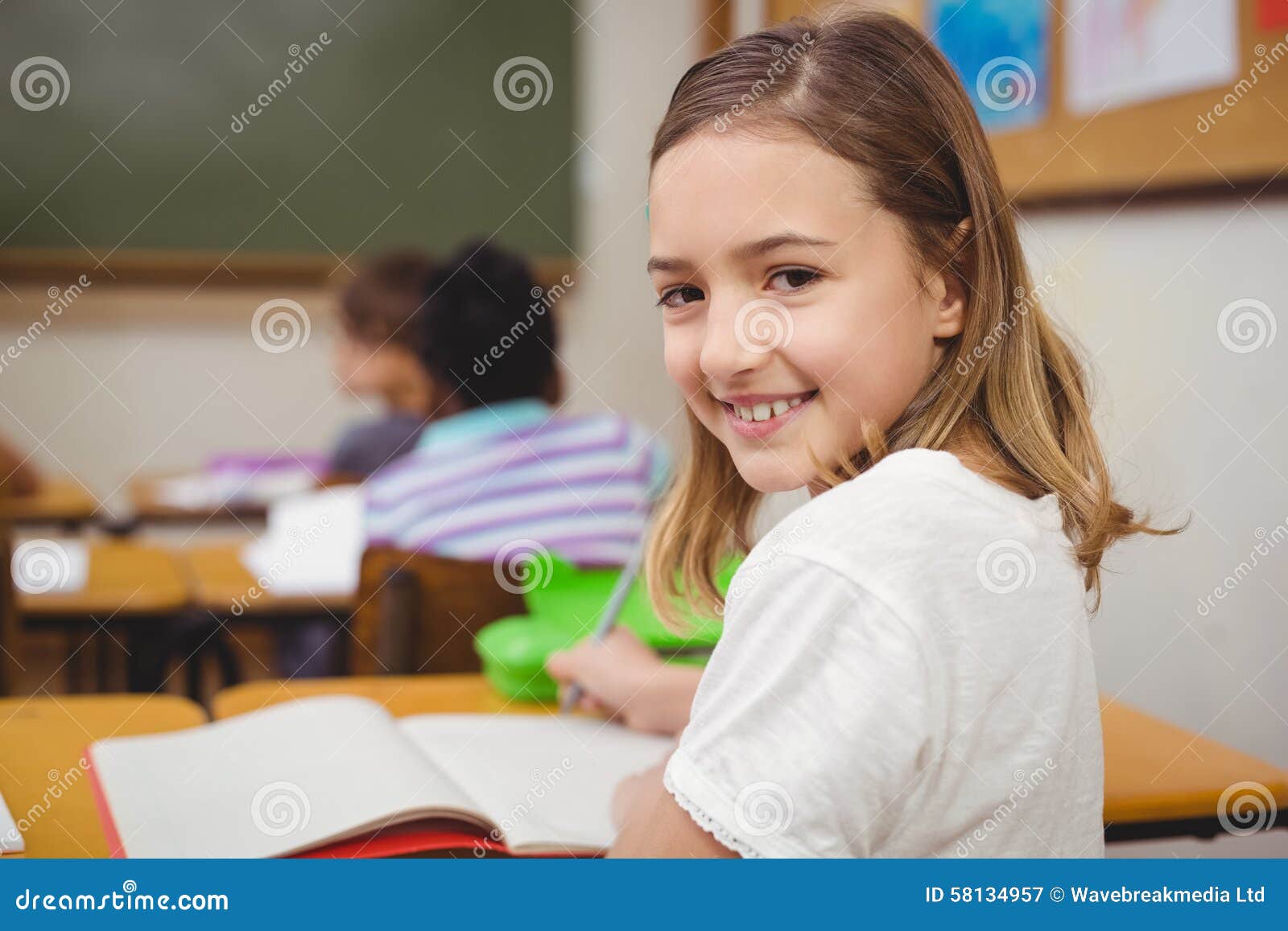 Pupil Smiling at Camera during Class Stock Image - Image of child, cute ...