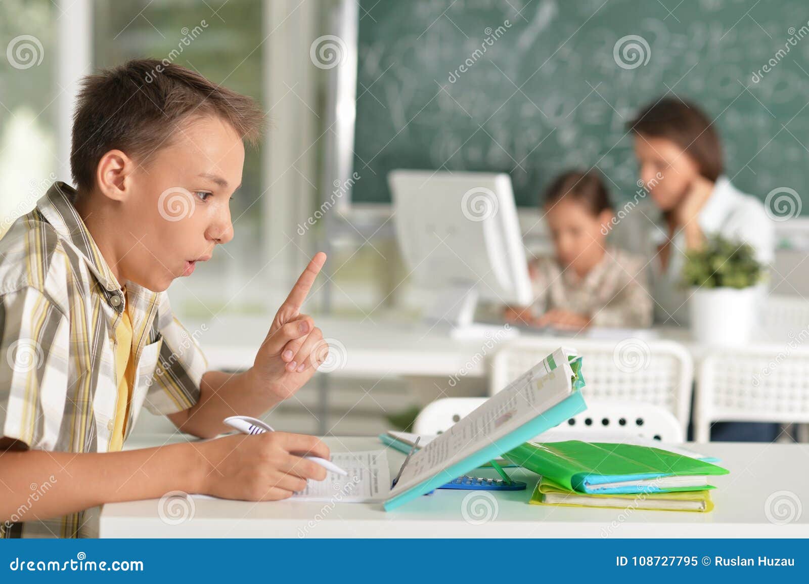 Pupil studying lessons stock image. Image of definition - 108727795