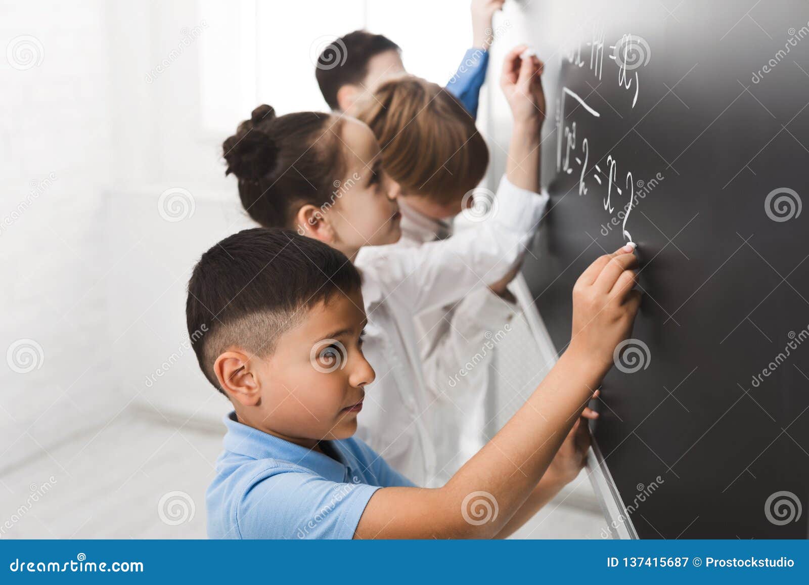 Pupil Writing Maths Equations on the Board Stock Image - Image of ...
